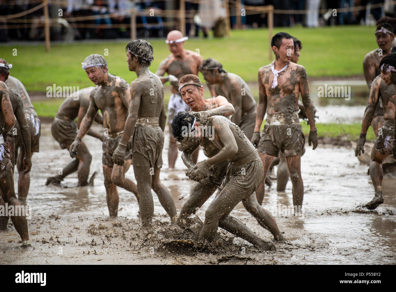 JUNE 24, 2018 - Men fight in a muddy rice field during Isobe-no-Omita ...