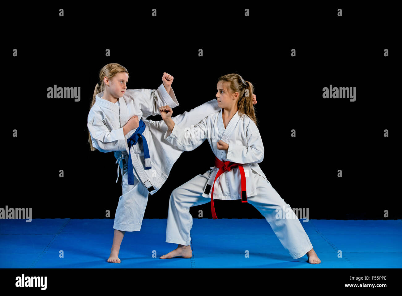 Karate martial Arts Two little girls demonstrate martial arts working ...