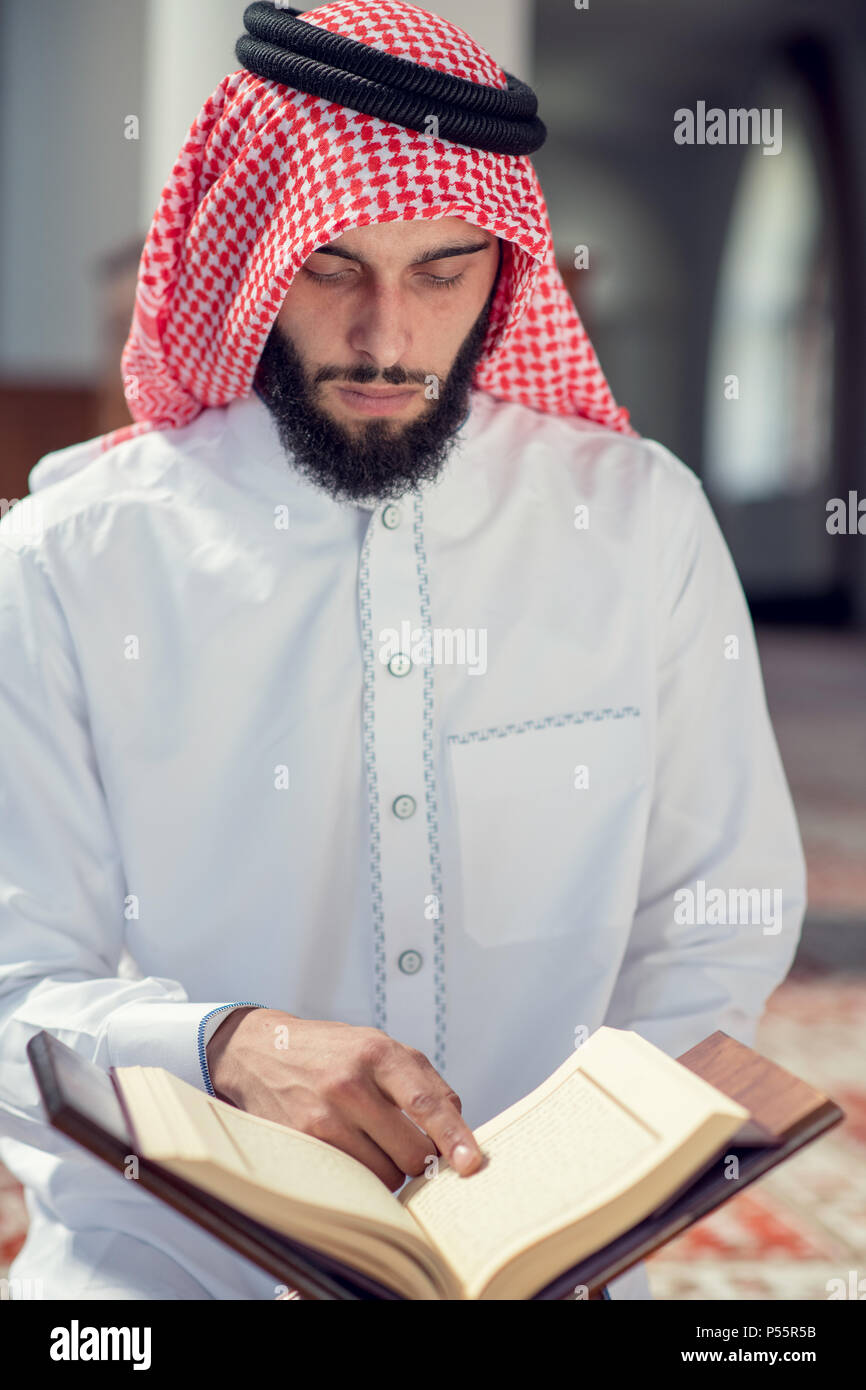 Religious muslim man praying inside the mosque Stock Photo - Alamy