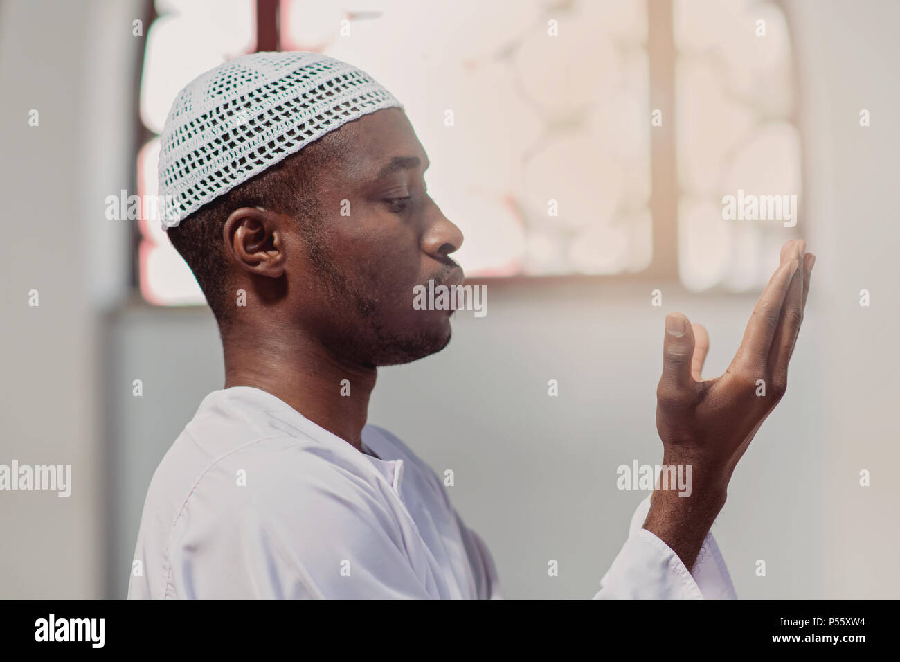 Muslim Man Is Praying In The Mosque Stock Photo - Alamy