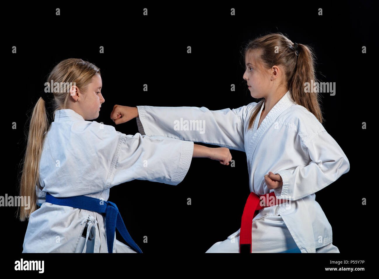 Karate martial Arts Two little girls demonstrate martial arts working ...