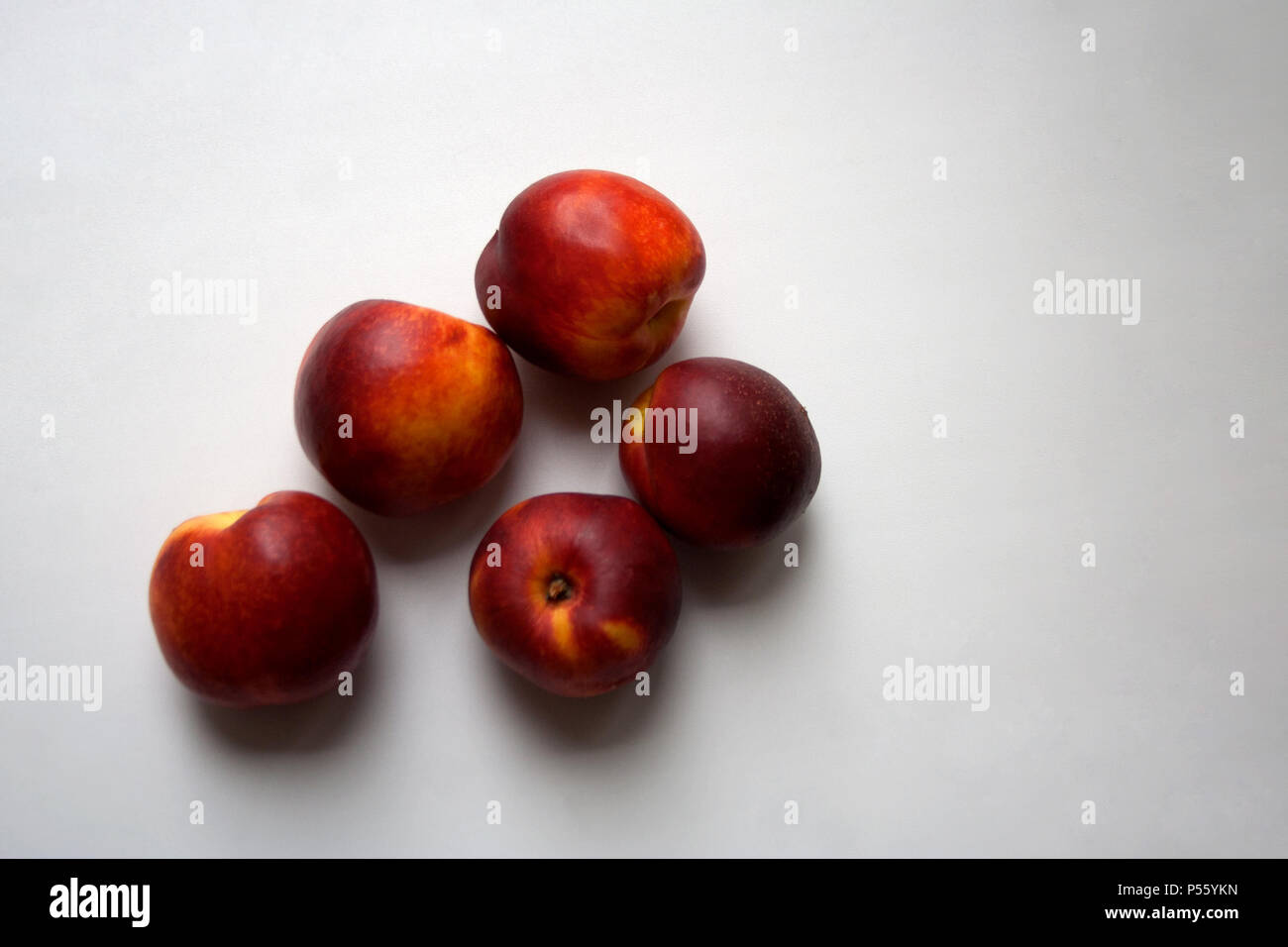Nectarine fruits isolated on white background close up Stock Photo - Alamy