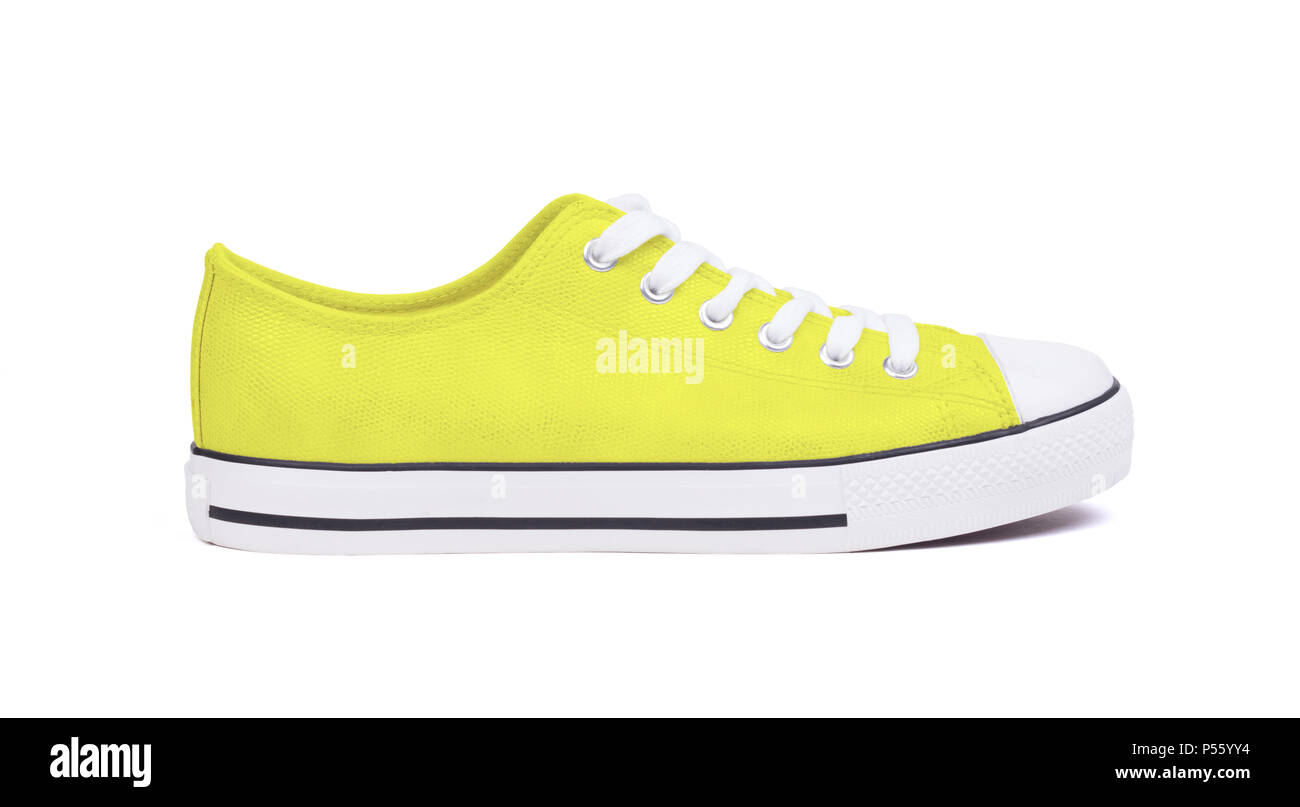 New sneaker shoe, isolated on a white background - Yellow Stock Photo ...