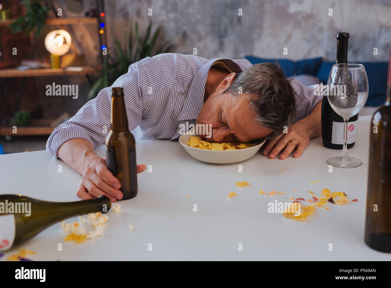 Middle age drinking alcohol hi-res stock photography and images - Alamy