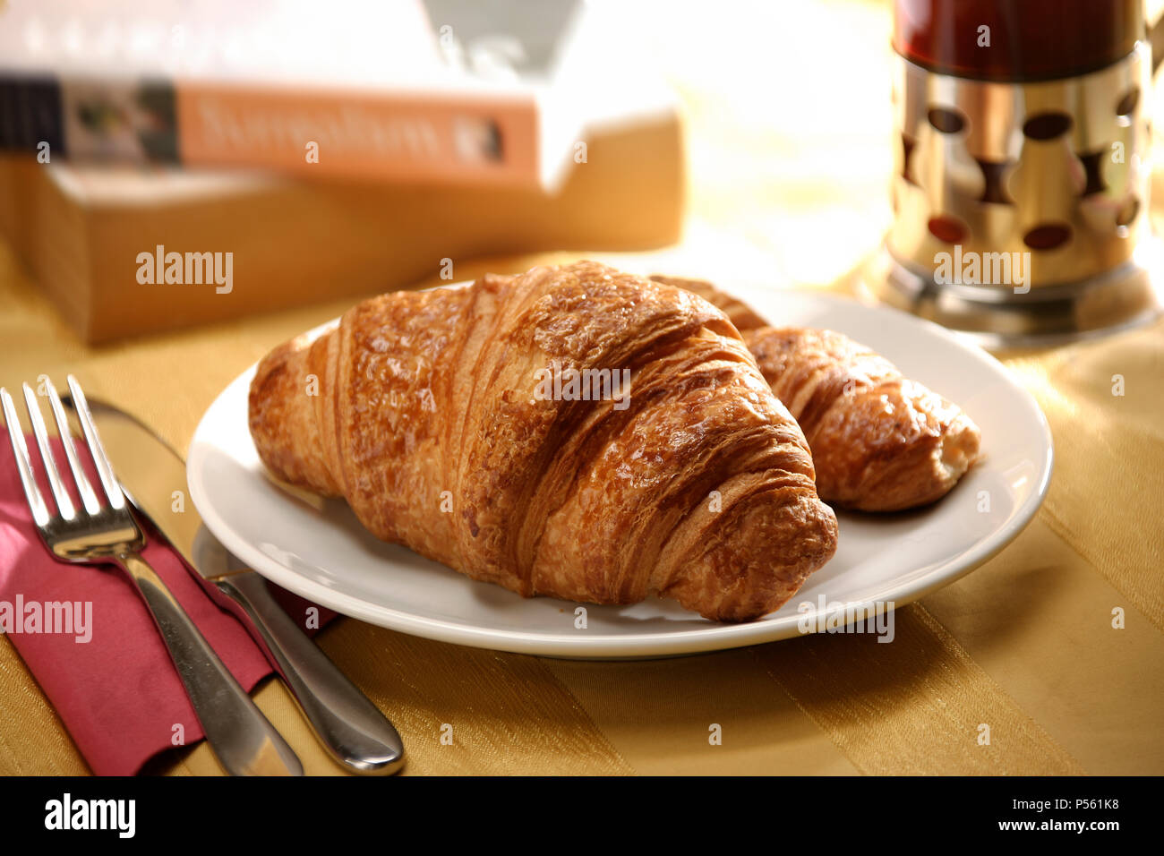 close up image of croissant and tea Stock Photo - Alamy