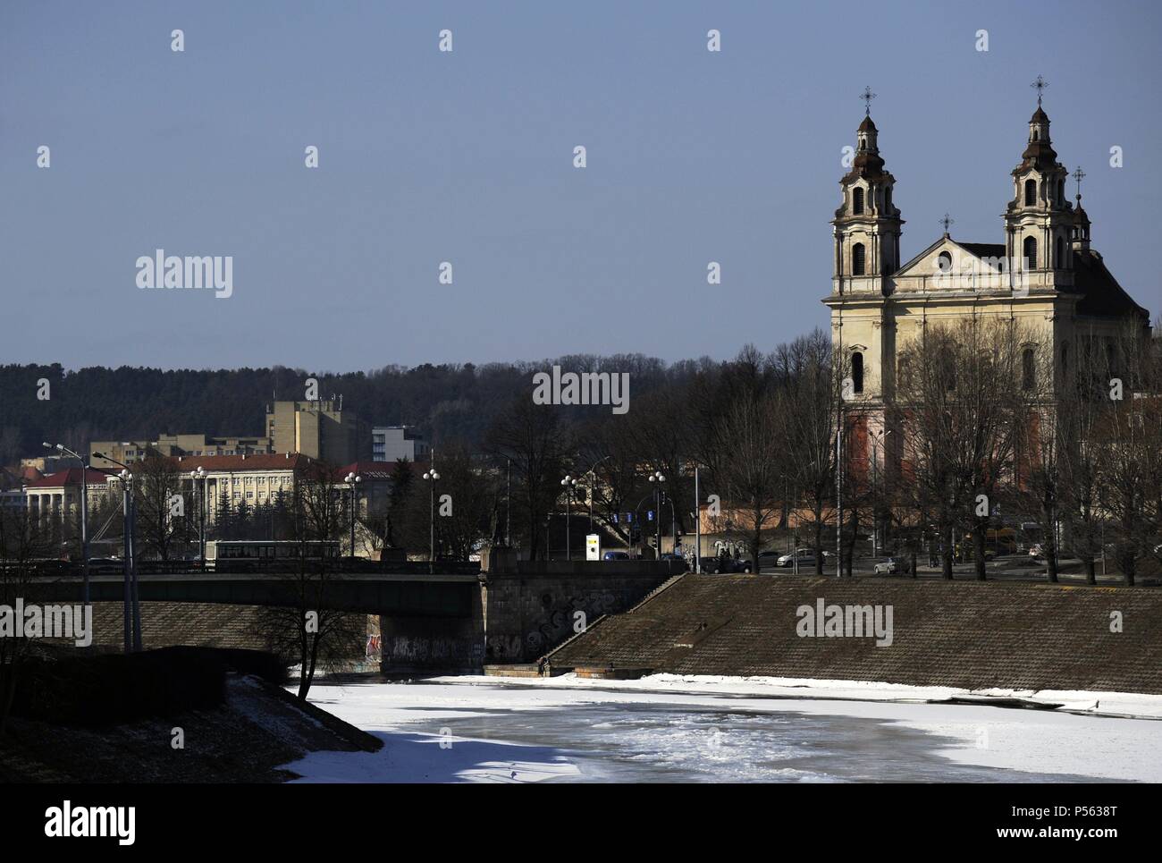 Lithuania. Vilnius. Frozen waters of the Neris river. At background ...