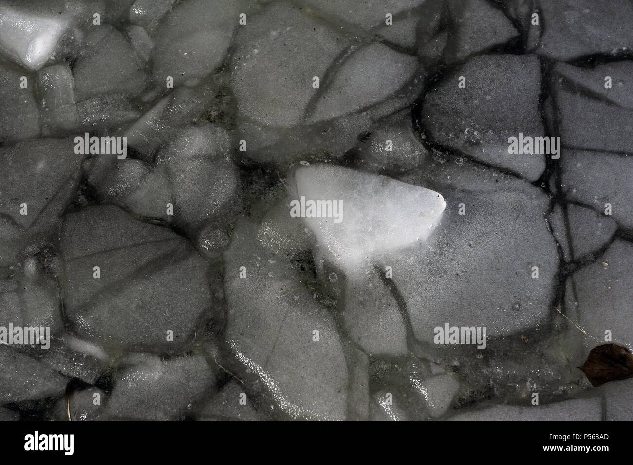 Frozen water in a fountain Stock Photo - Alamy