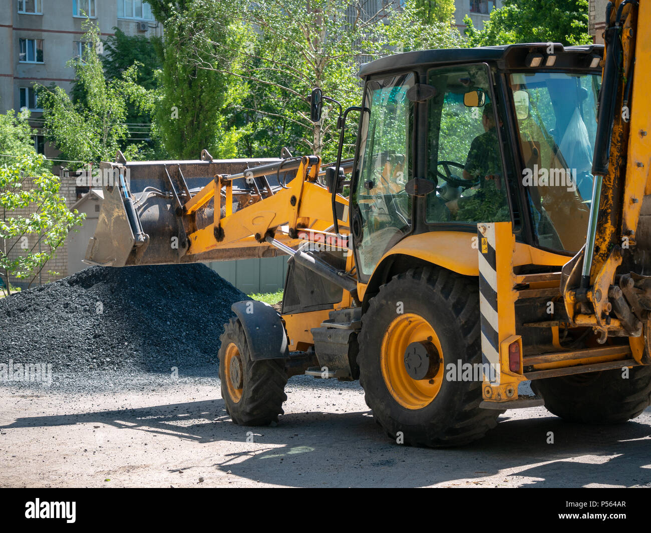 Buldozer Making and constructing a new asphalt road near the civil ...