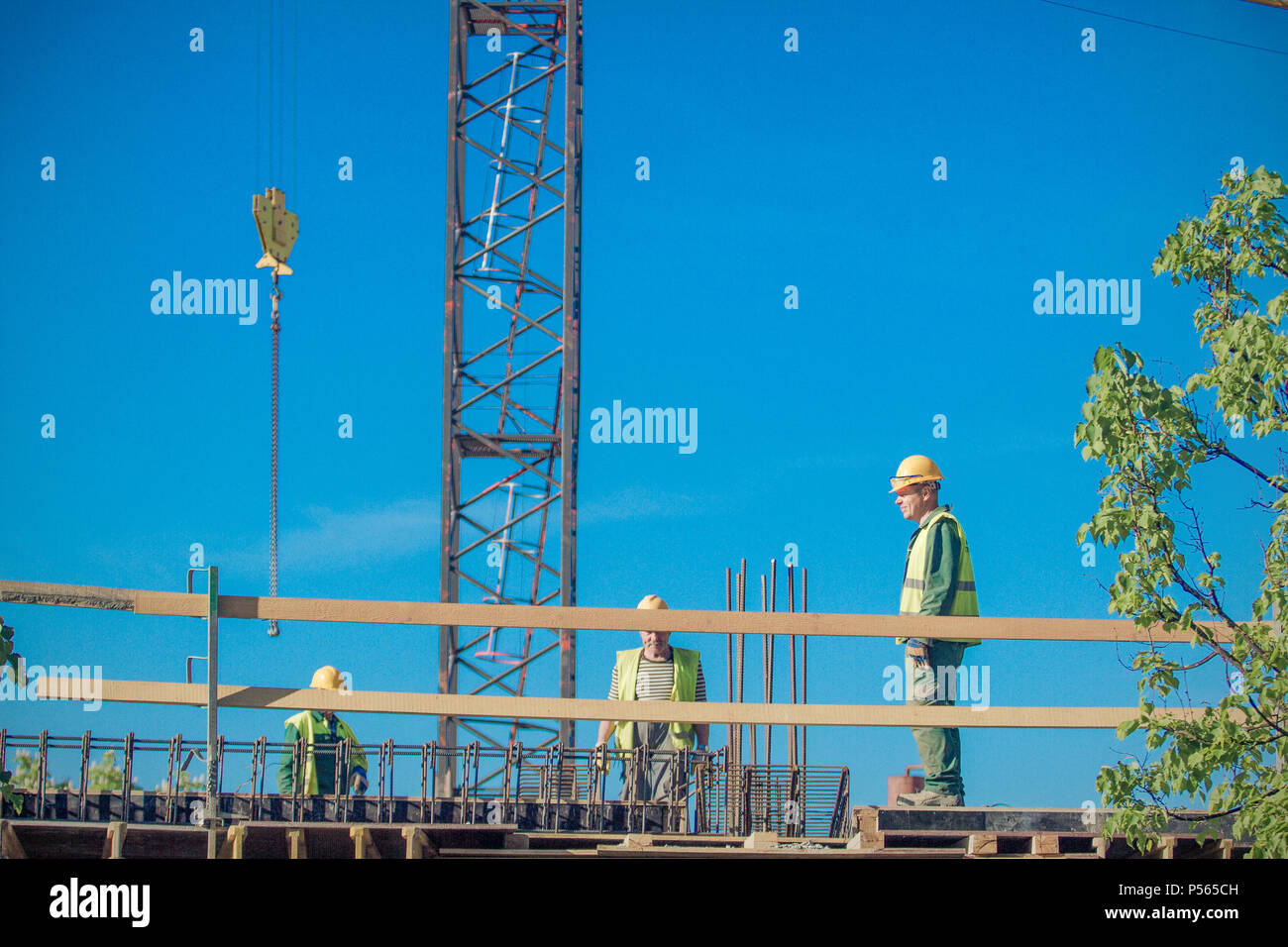 Workers on new building construction site in Vilnius, Lithuania Stock ...