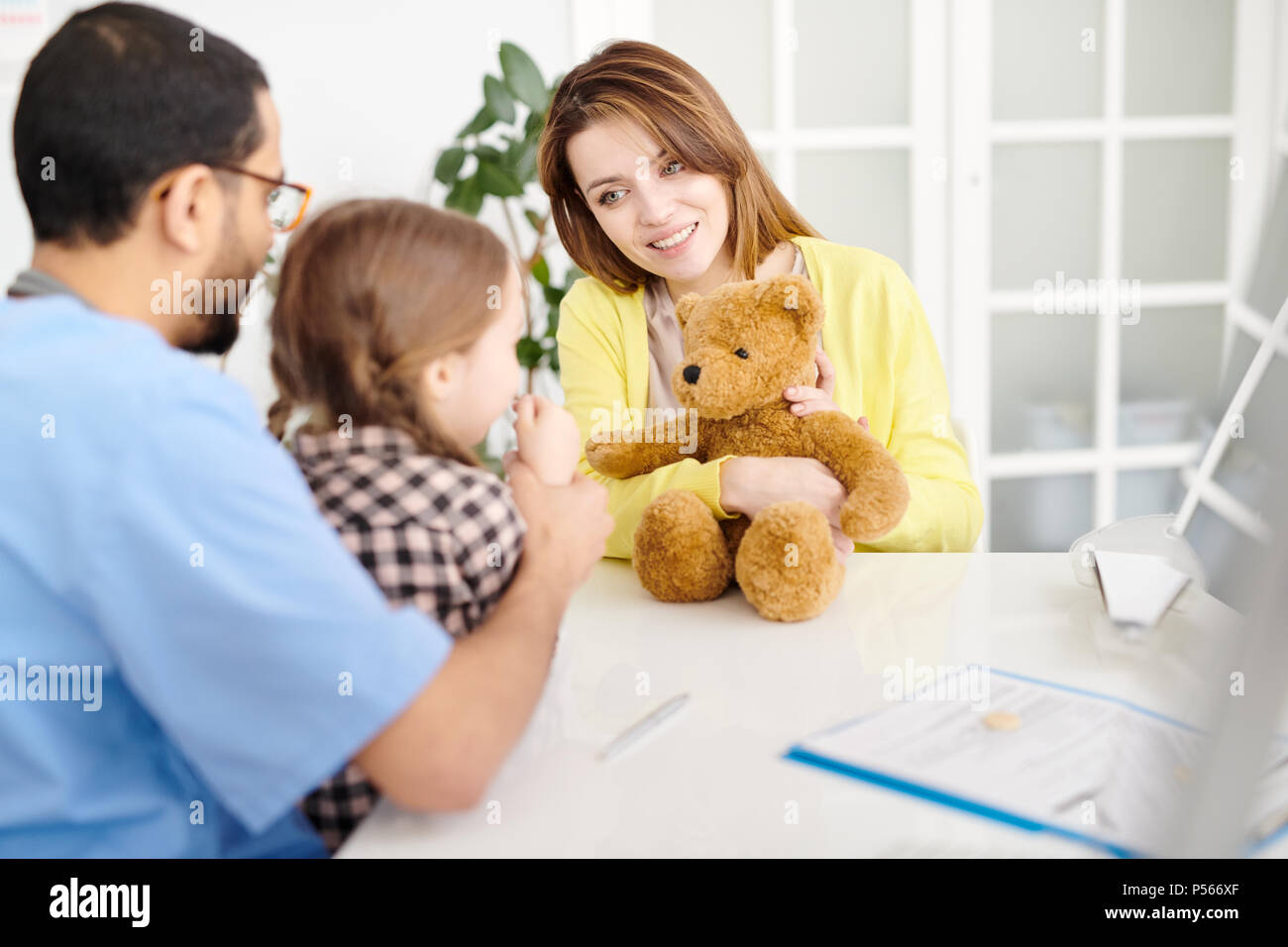 Loving Mother Comforting Scared Little Girl Stock Photo - Alamy