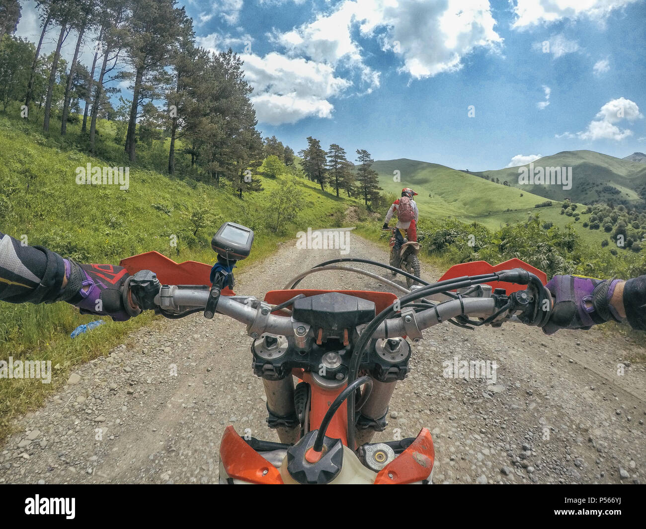 Bike speed journey in the mountains with the dirt bike Enduro in Caucasus Georgia Stock Photo ...