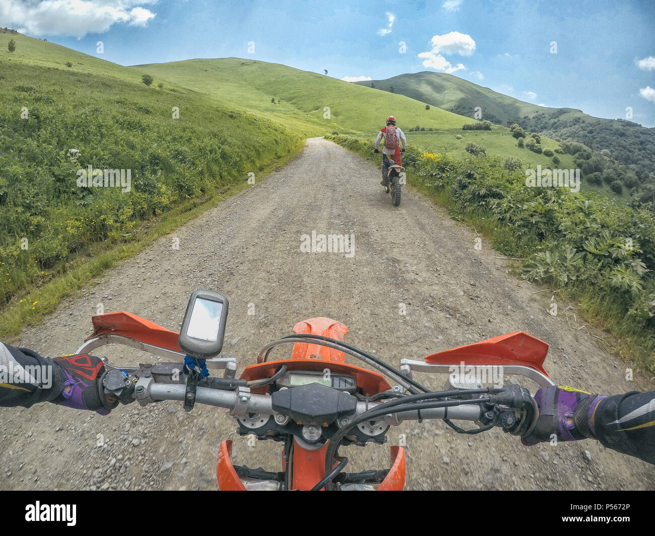 Bike speed journey in the mountains with the dirt bike Enduro in Caucasus Georgia Stock Photo ...