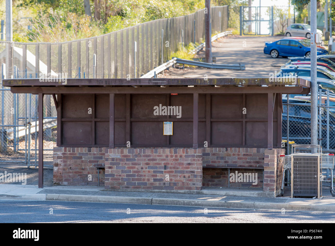 A clinker brick, timber and steel roof bus stop in Turramurra, Sydney ...