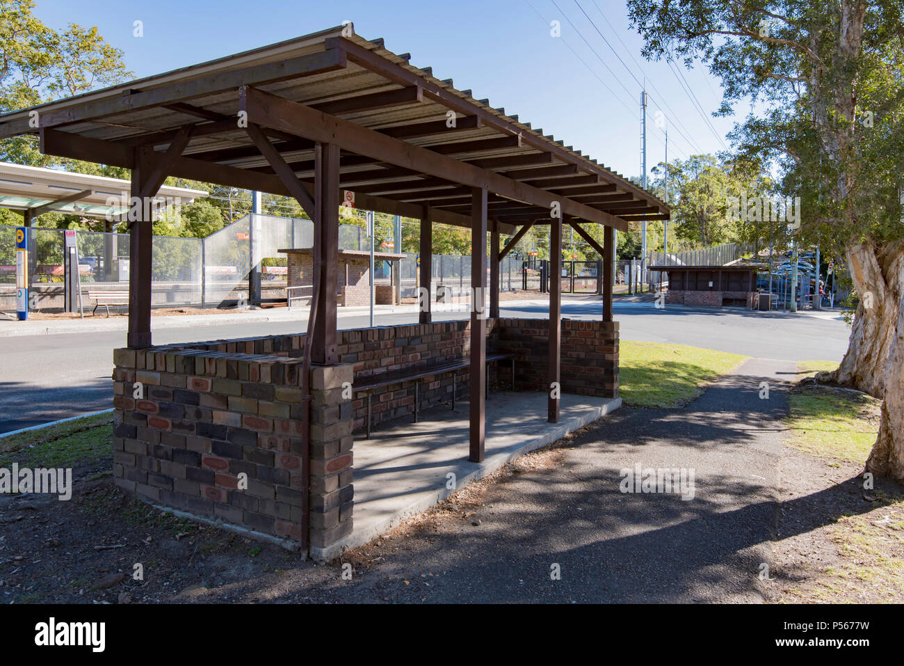 A clinker brick, timber and steel roof bus stop in Turramurra, Sydney ...