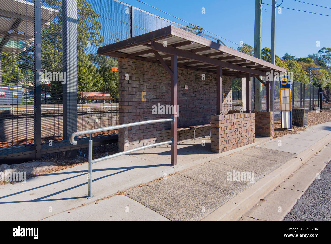 A clinker brick, timber and steel roof bus stop in Turramurra, Sydney ...