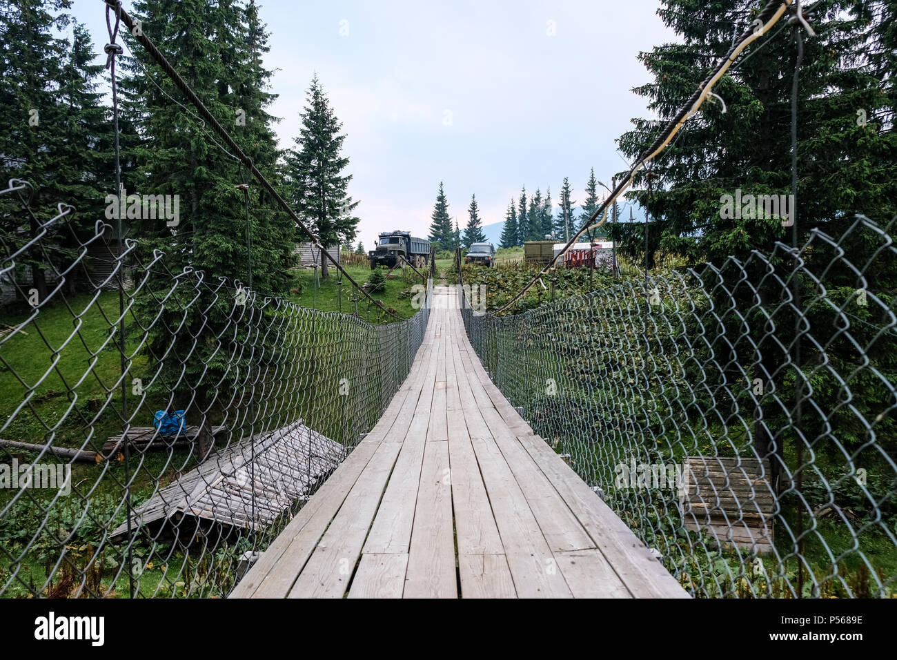 Suspended bridge in Dragobrat (Ukraine). Summer on the mountain of the ...