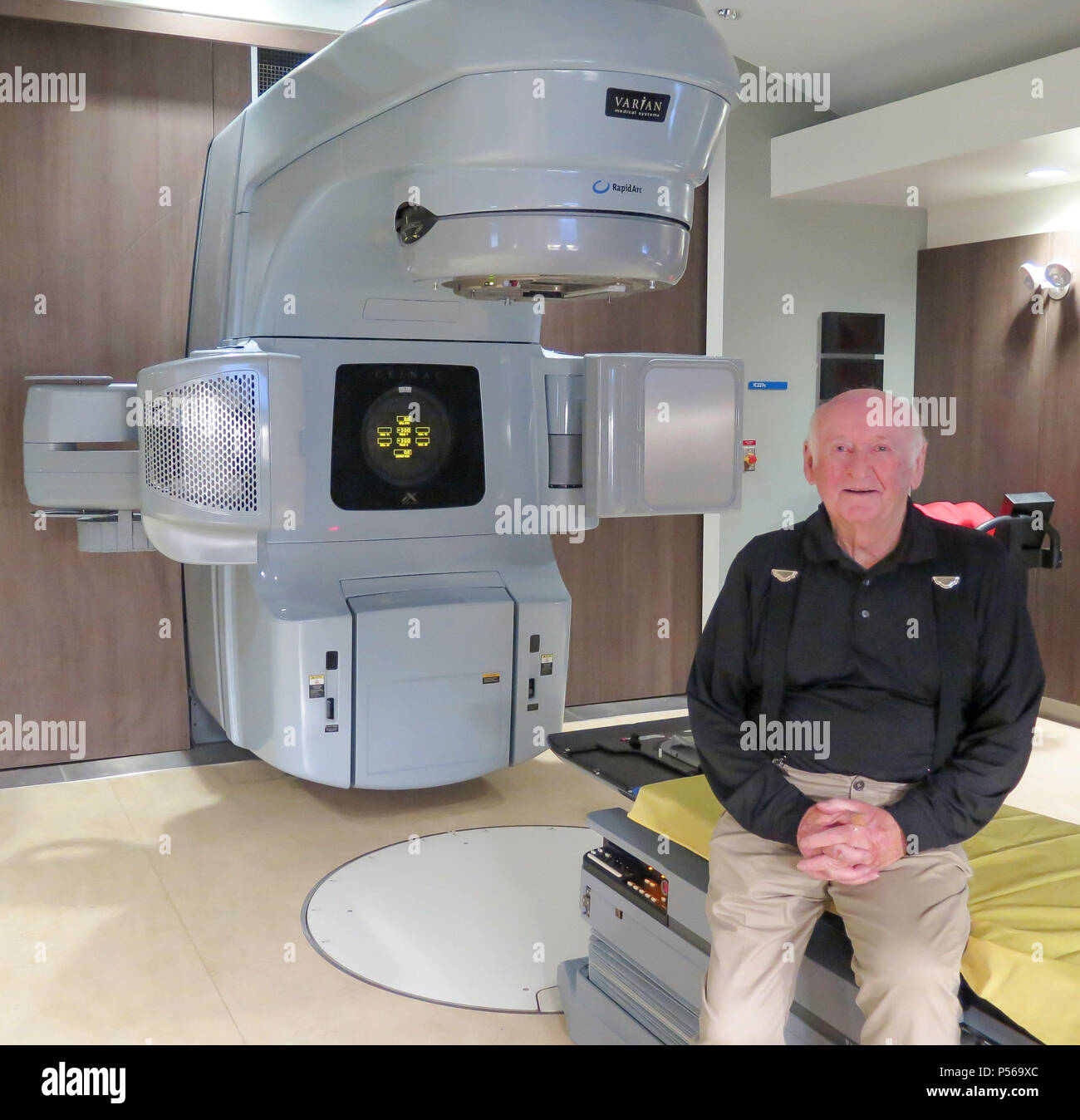 Adult Man receives Radiation Therapy his head in a Hospital environment ...