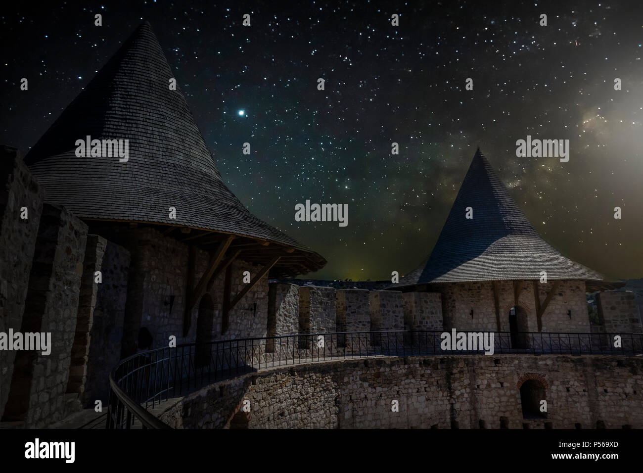 Architectural details of medieval fort at night, with stars on ...