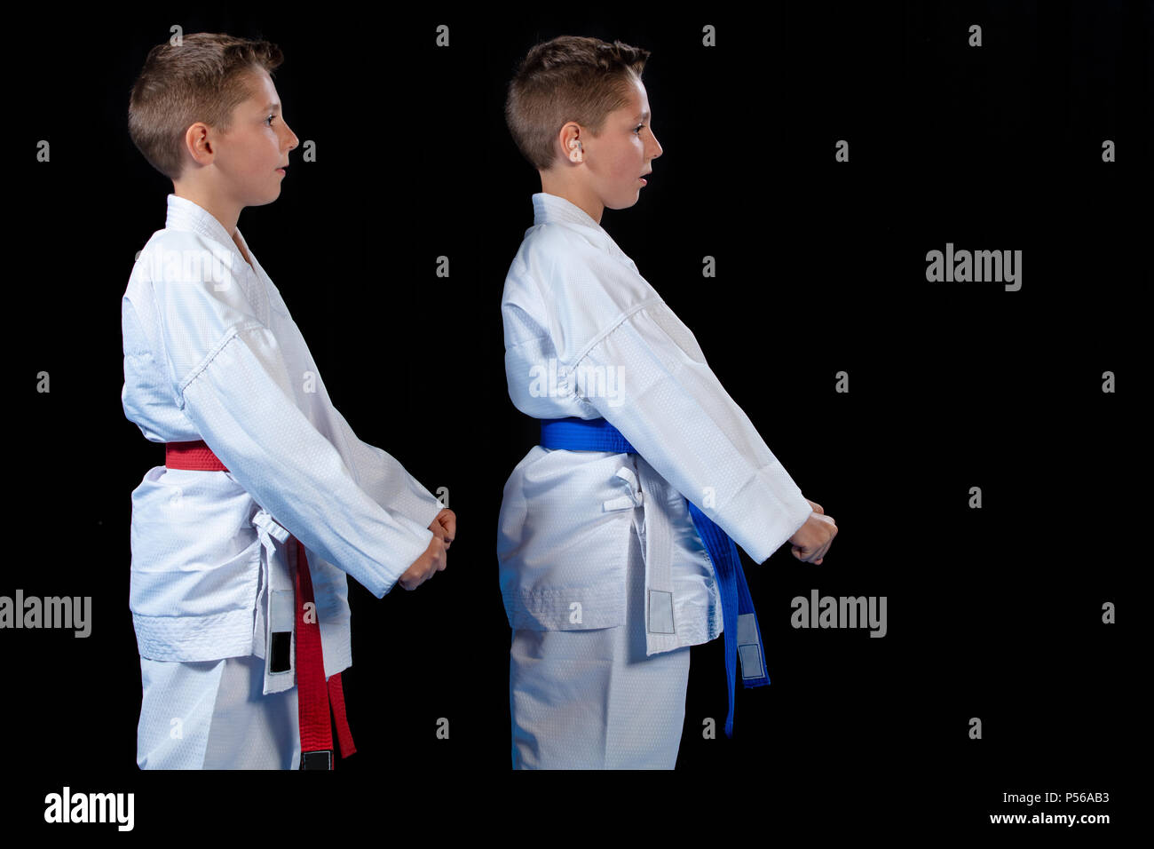 two boys training karate kata exercises at test qualification Stock ...