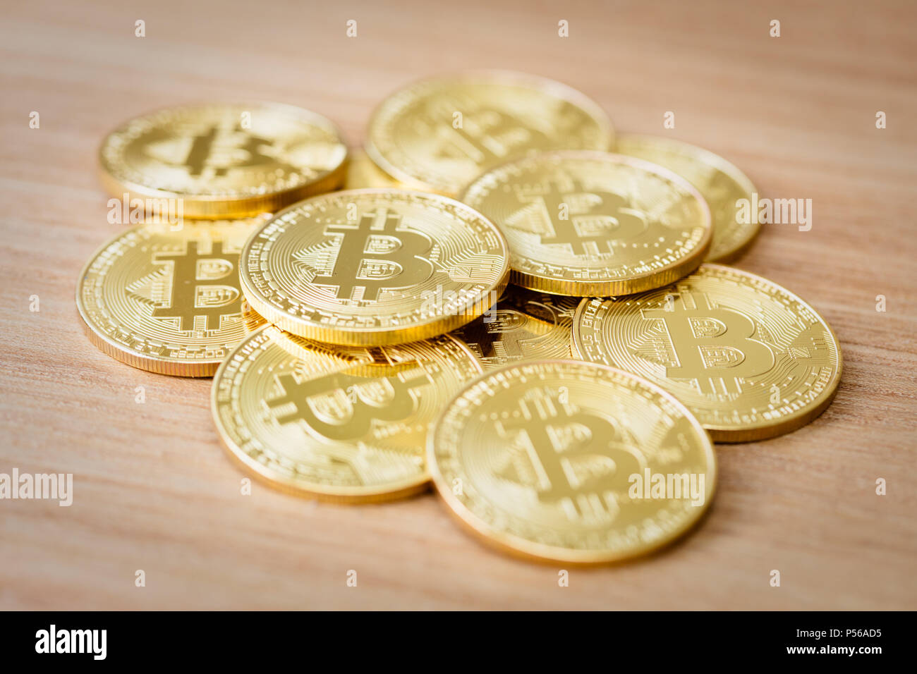 A pile of Bitcoins with an isolated background Stock Photo - Alamy