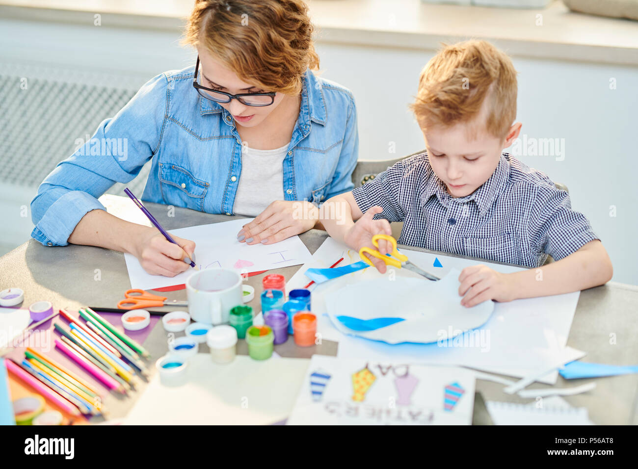 Parent teacher child together hi-res stock photography and images - Alamy
