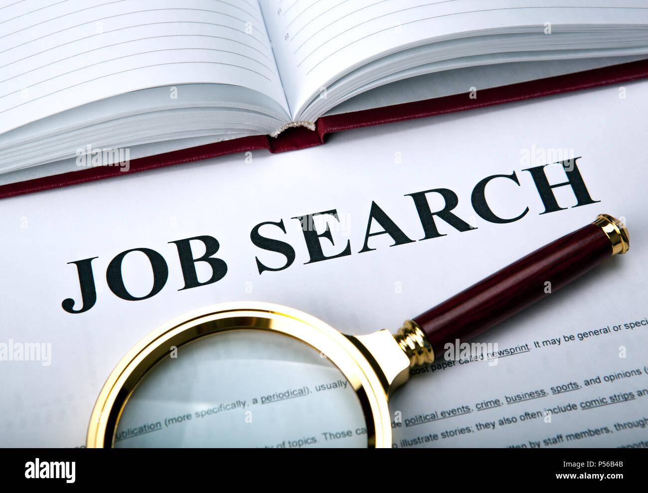 title job search with loupe and diary Stock Photo - Alamy