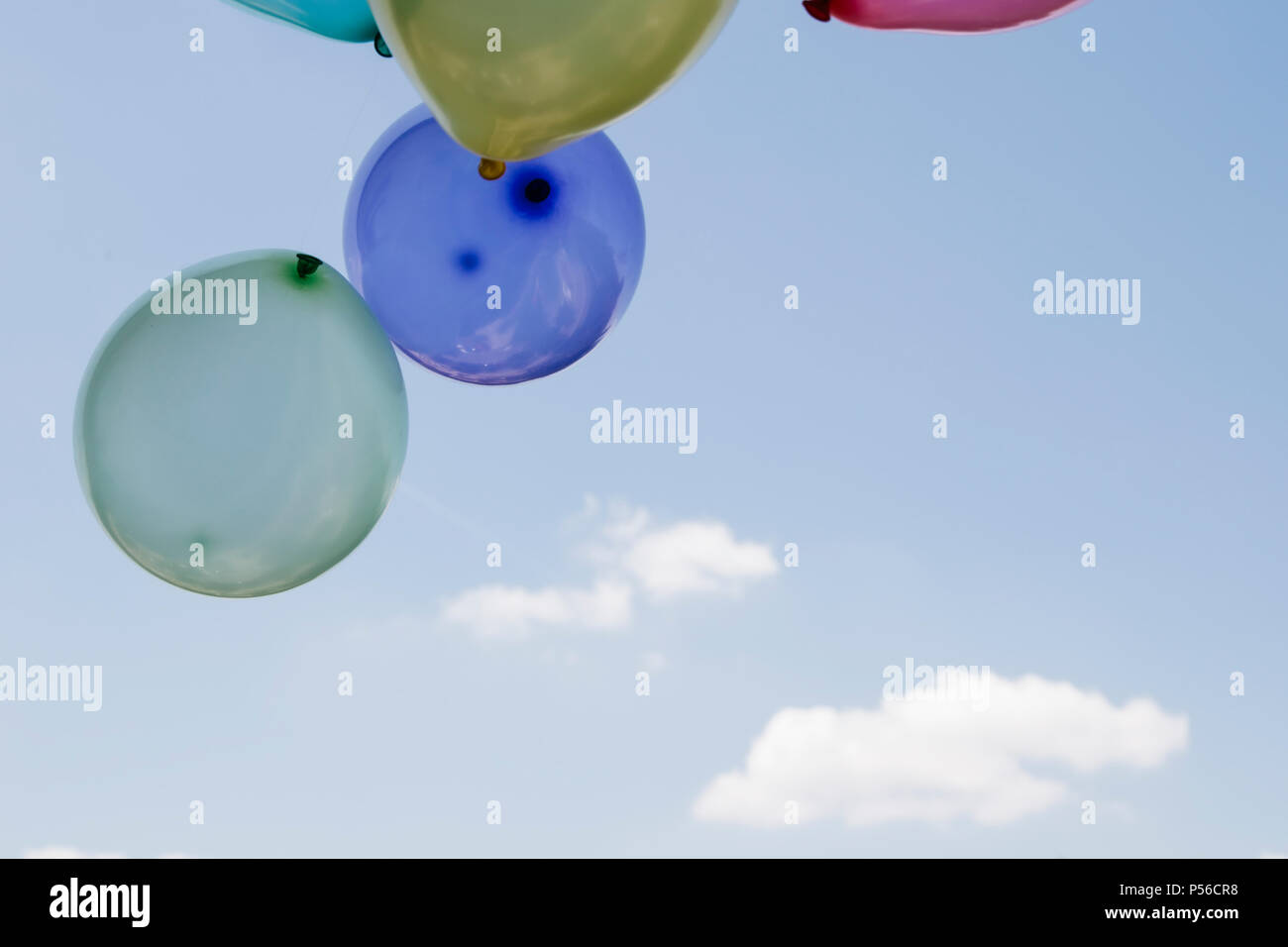 Colorful balloons fly in the sky hi-res stock photography and images ...