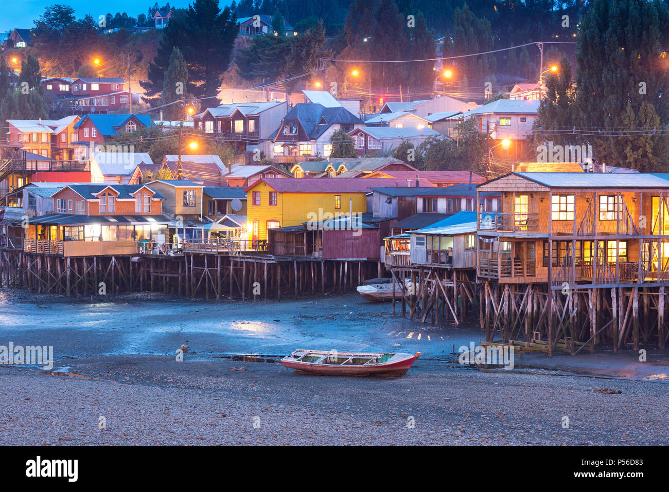 Traditional stilt houses know as palafitos in the city of Castro at ...
