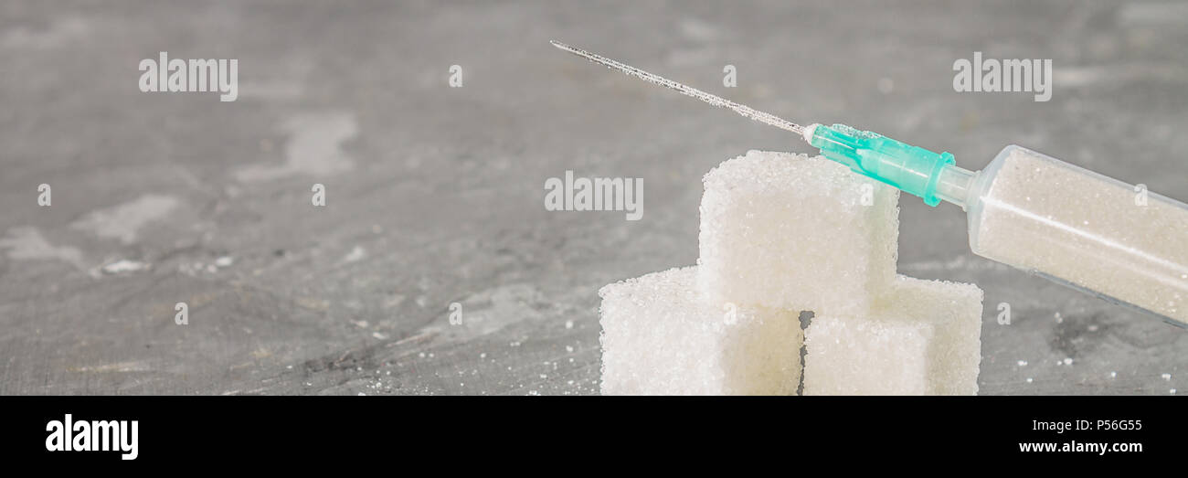 Sugar in a syringe. Conceptual depiction of dependence on the sweet ...