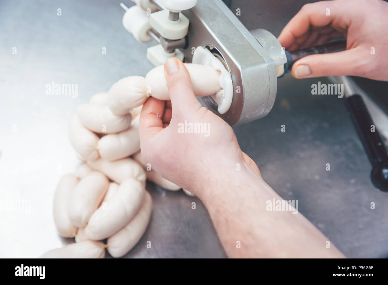Butcher sausage production hi-res stock photography and images - Alamy