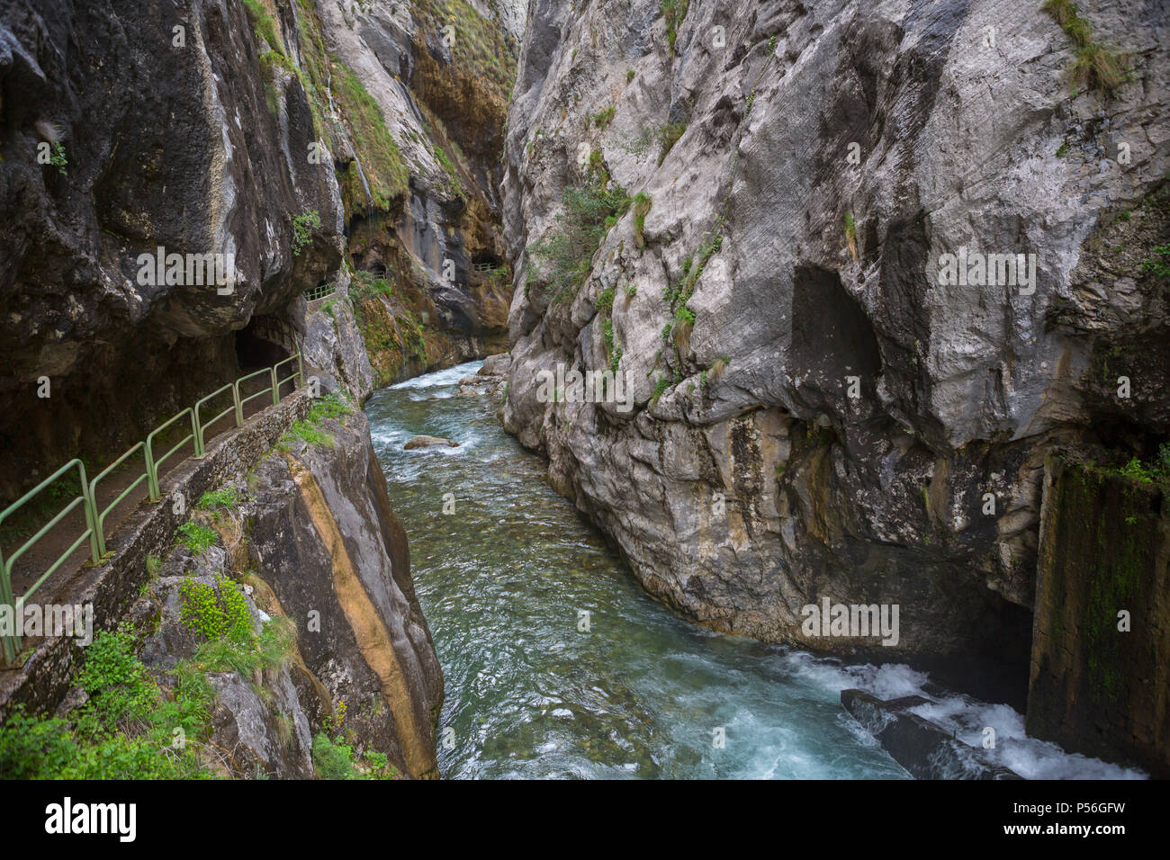 Entrance of the hiking trail Ruta del Cares along river Cares in Cain ...