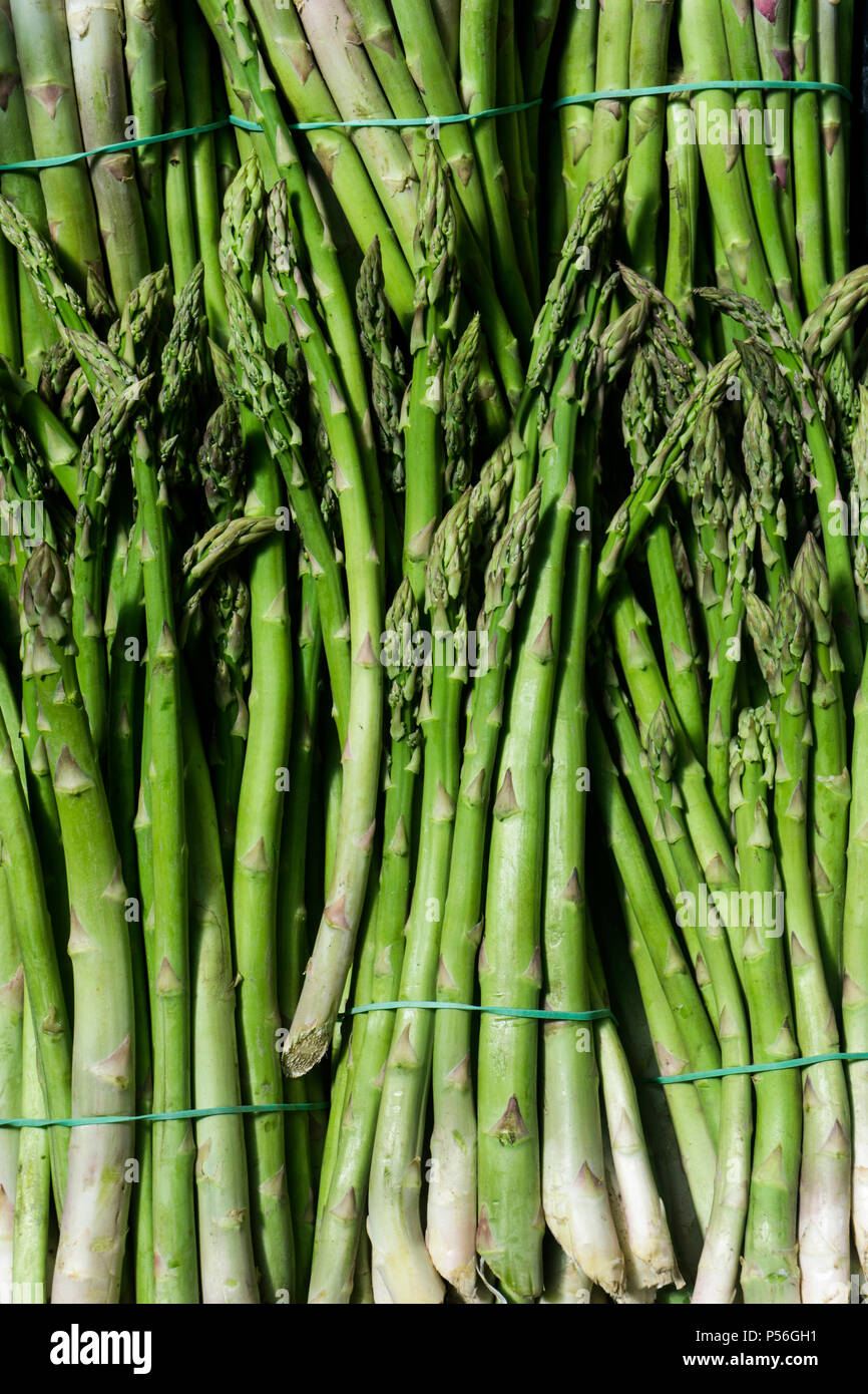 Fresh green asparagus background Stock Photo - Alamy