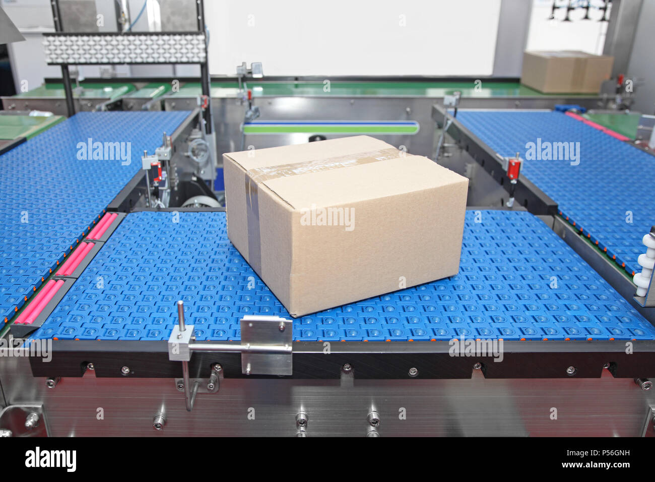 Packaging and Handling Box at Conveyor Transport System Stock Photo - Alamy