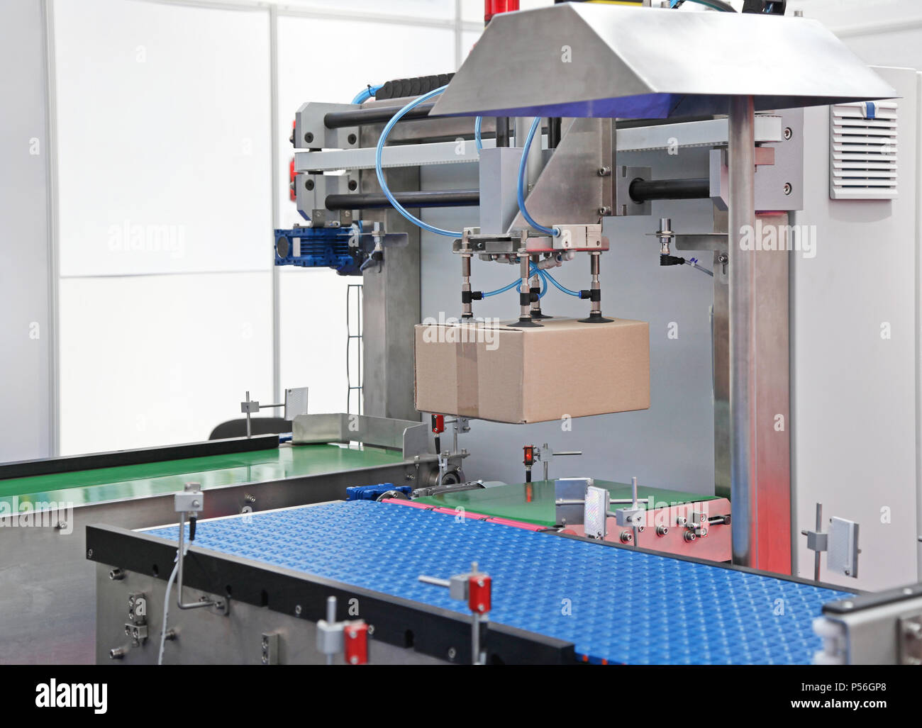 Handling Package at Automated Line in Distribution Warehouse Stock ...