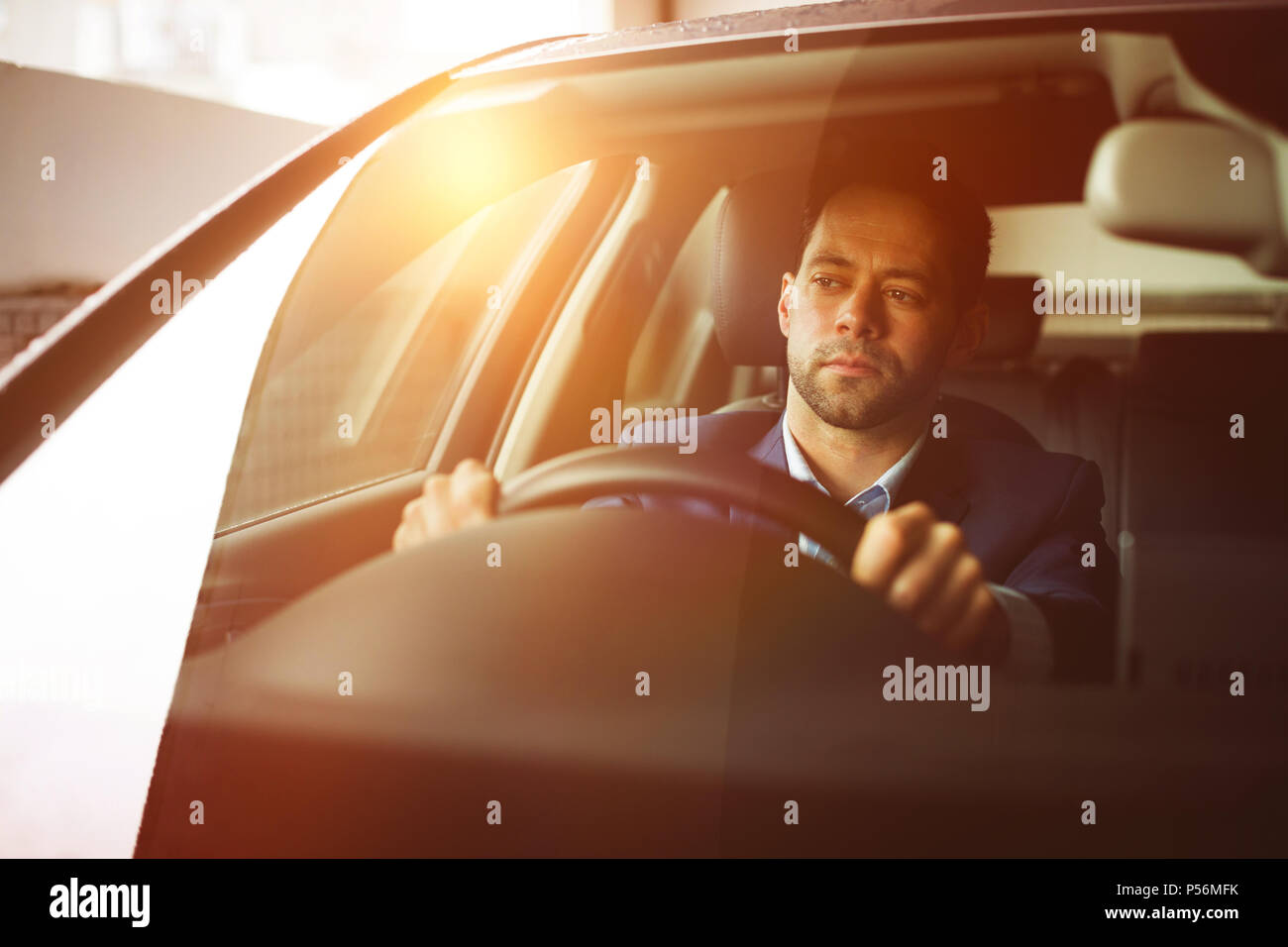 Man driving car Stock Photo - Alamy