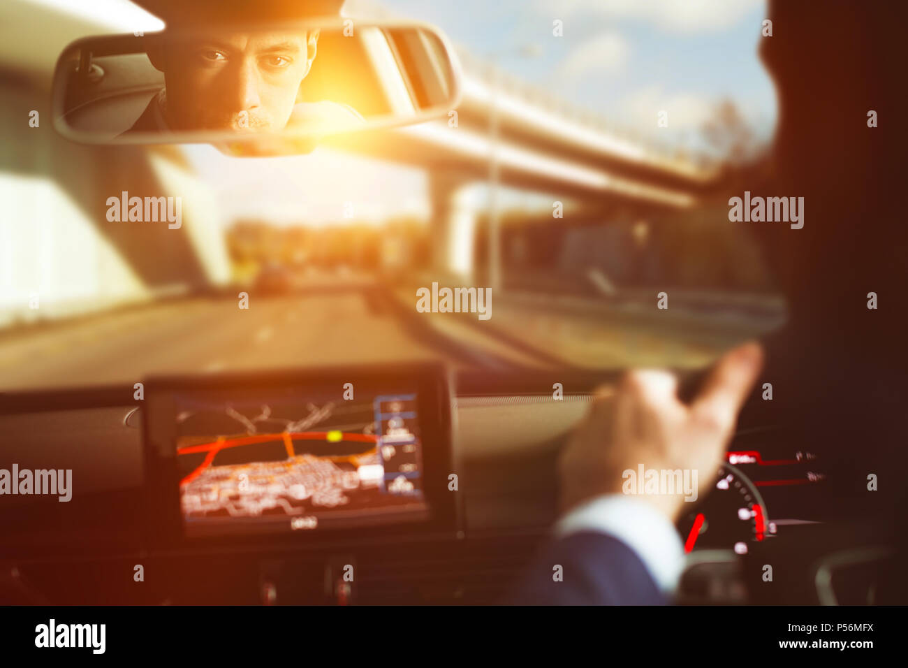 Rear view man driving car hi-res stock photography and images - Alamy