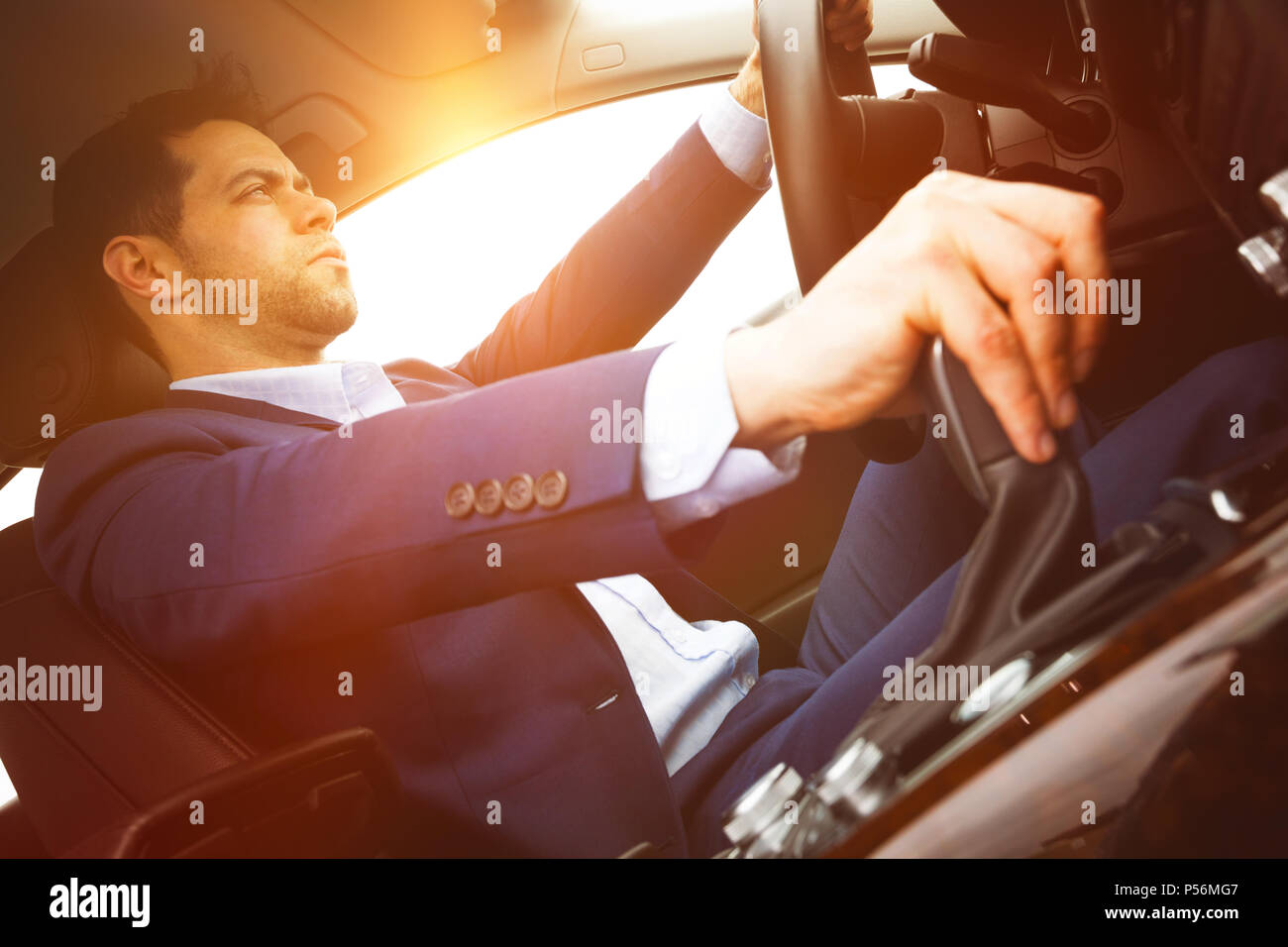 Man driving car Stock Photo - Alamy
