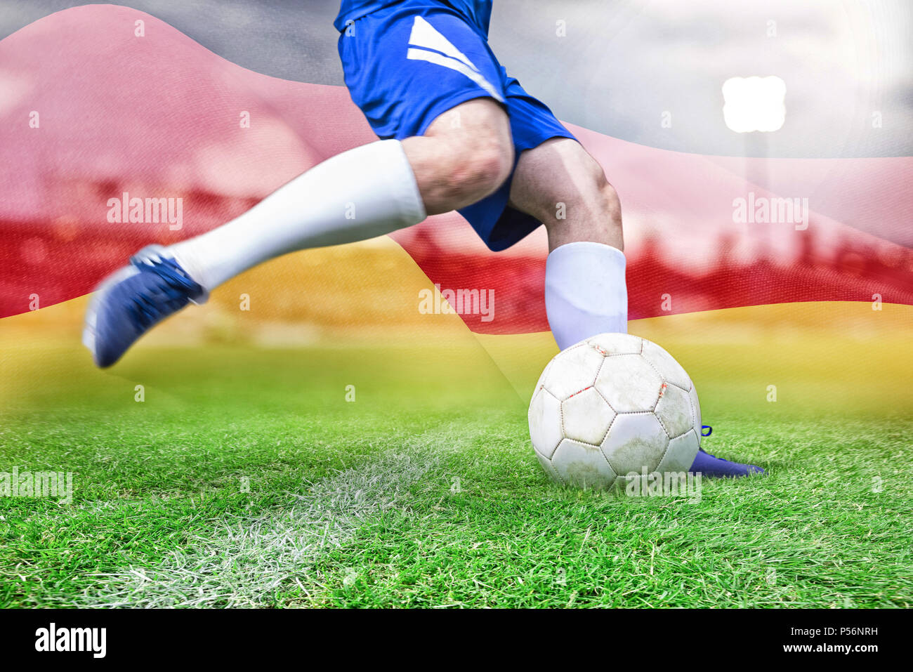 Football player kicking ball hi-res stock photography and images - Alamy