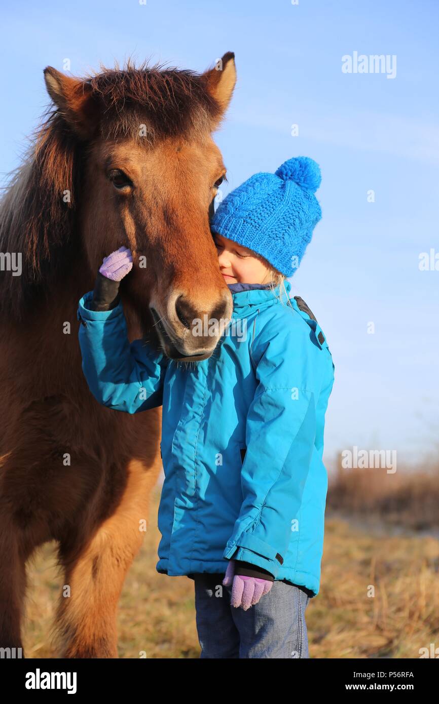Cuddle cuddling ponies hi-res stock photography and images - Alamy