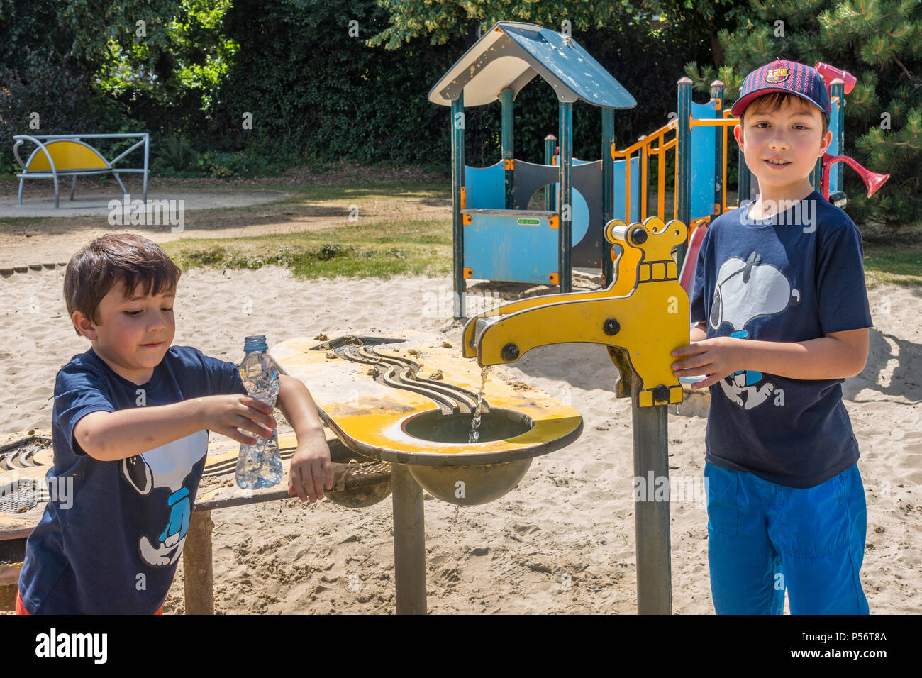 Children playing in the playground at Clewer Memorial Recreation Ground ...
