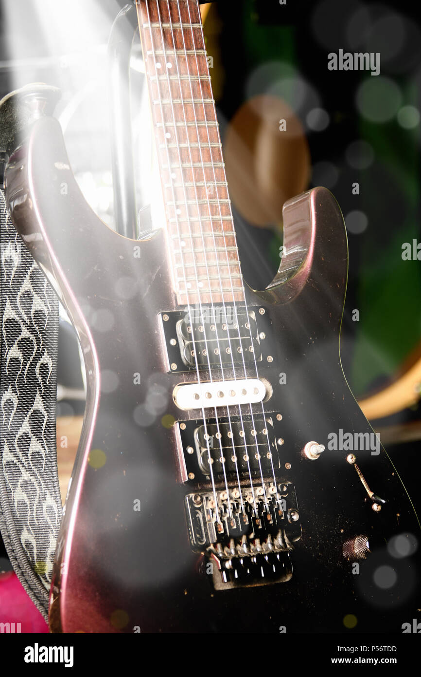 close up shot of a guitar with light beam Stock Photo - Alamy