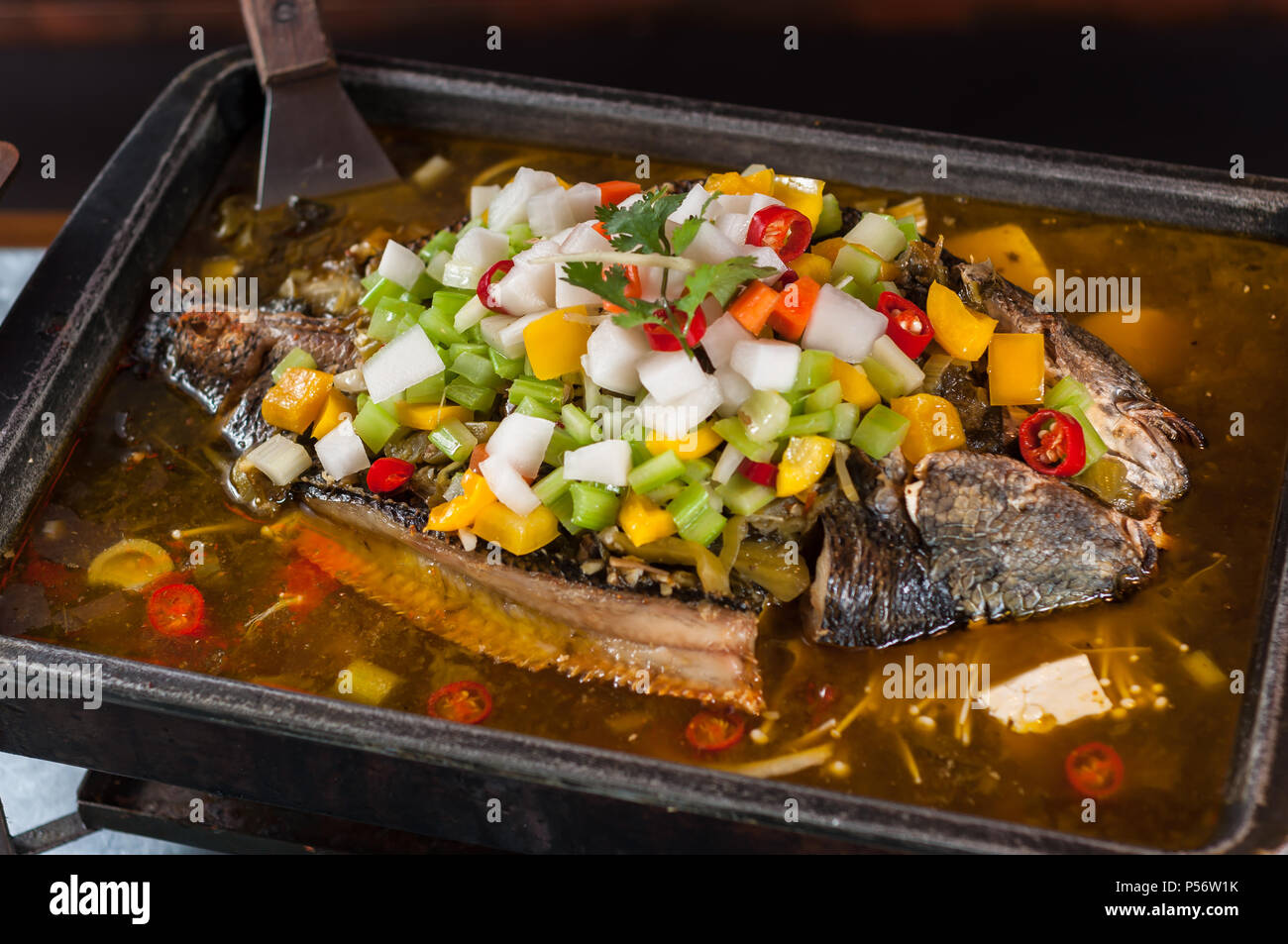 Chinese popular grilled fish Stock Photo - Alamy