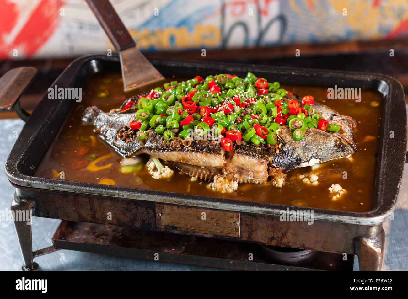 Chinese popular grilled fish Stock Photo - Alamy