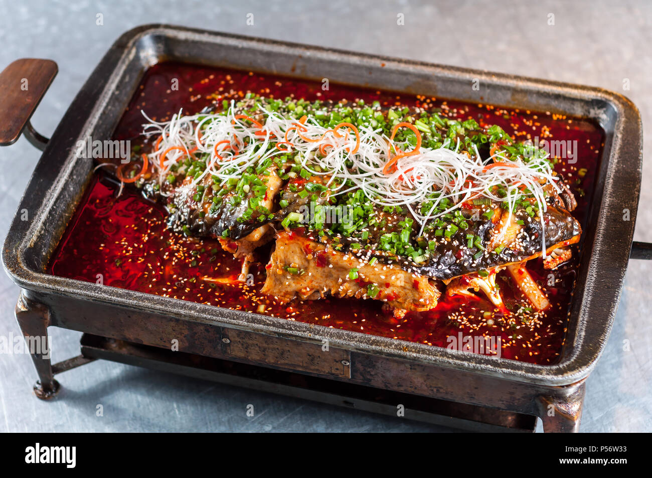 Chinese popular grilled fish Stock Photo - Alamy