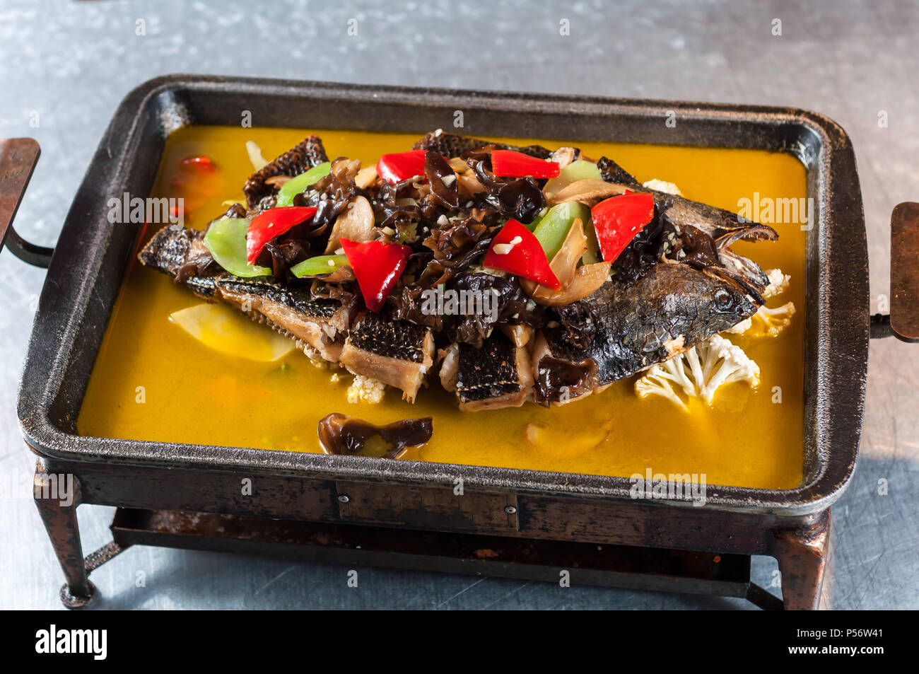 Chinese popular grilled fish Stock Photo - Alamy