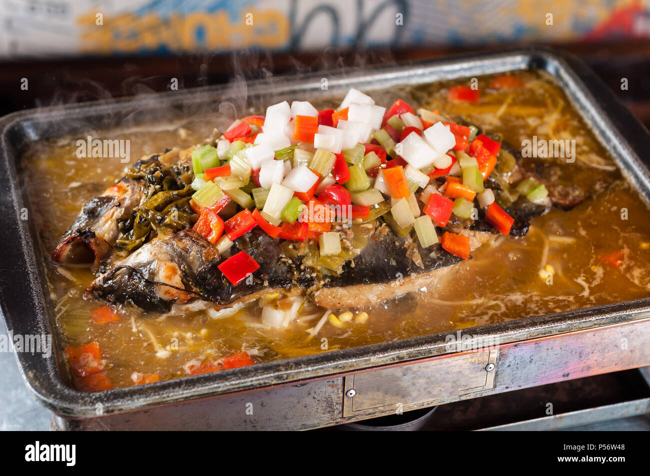 Chinese popular grilled fish Stock Photo - Alamy