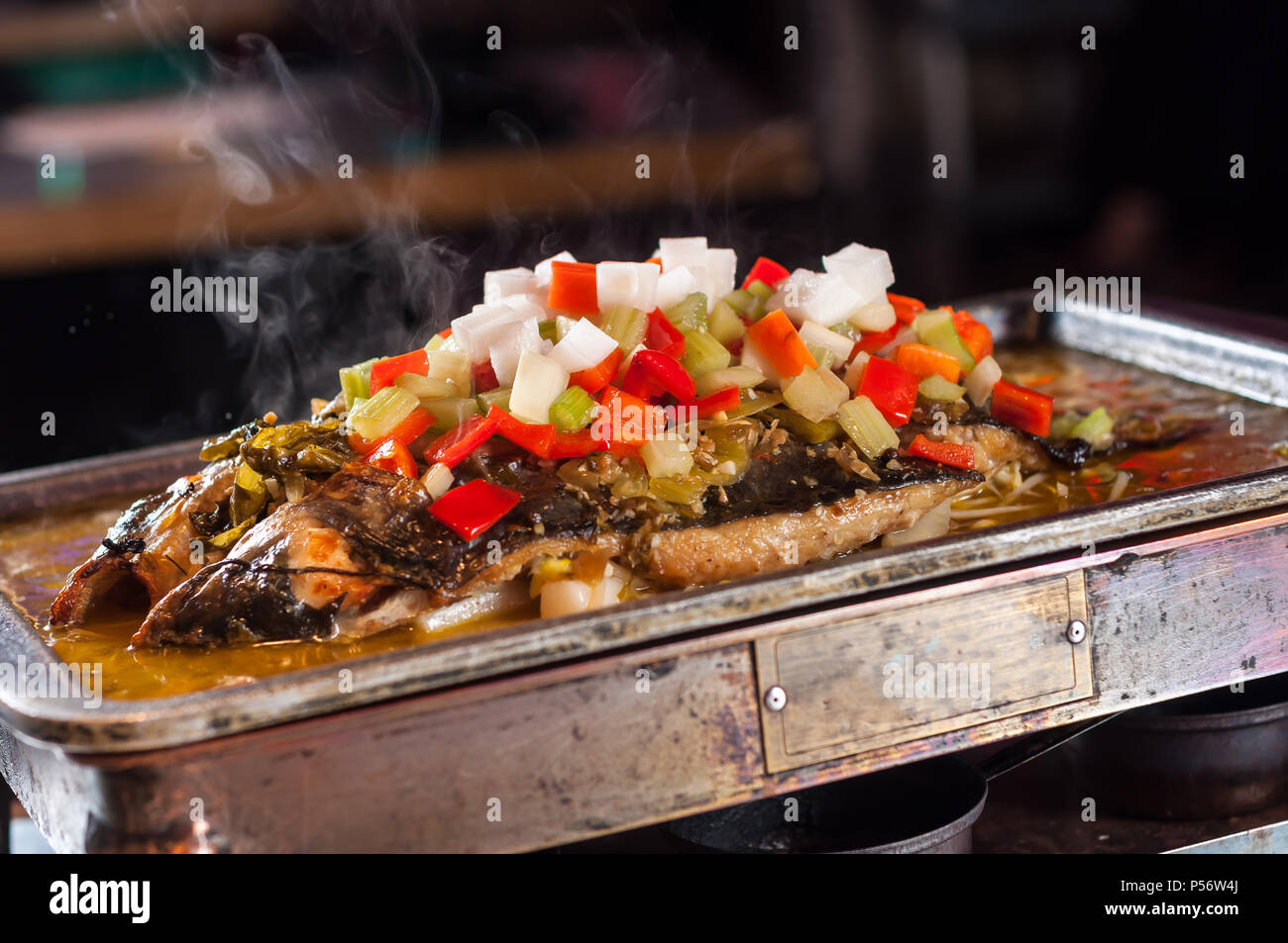 Chinese popular grilled fish Stock Photo - Alamy