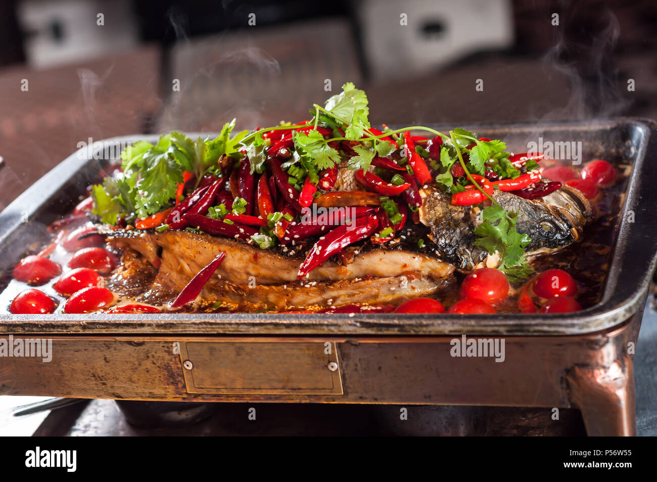 Chinese popular grilled fish Stock Photo - Alamy