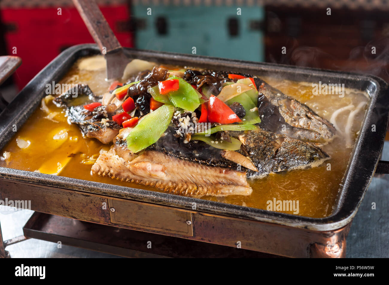 Chinese popular grilled fish Stock Photo - Alamy