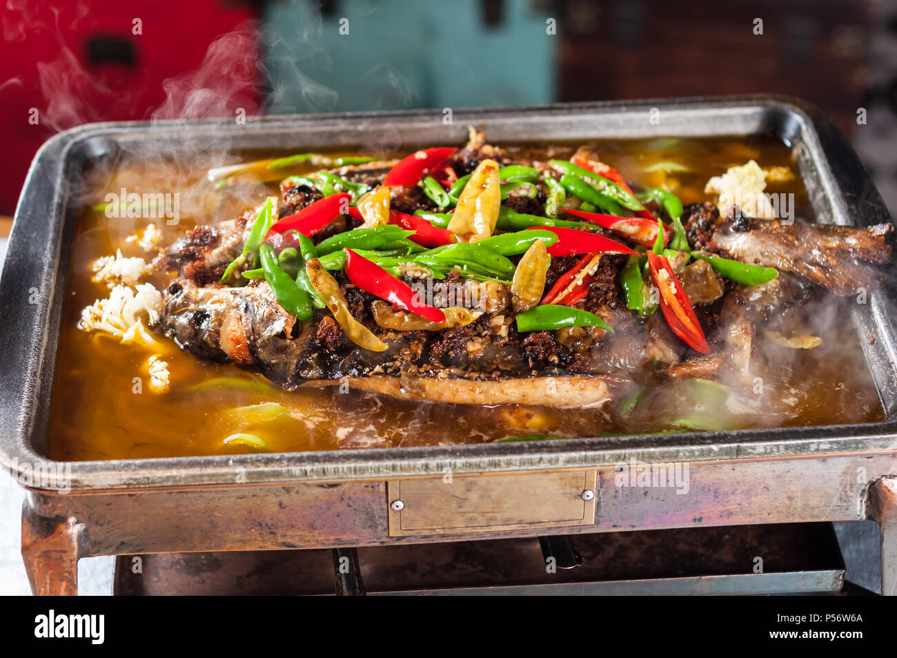 Chinese popular grilled fish Stock Photo - Alamy
